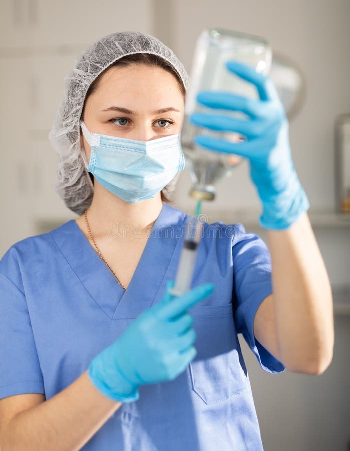 Nurse Fills Syringe with Injection Solution Stock Photo - Image of ...