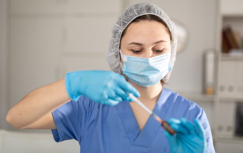 Nurse Fills Syringe with Injection Solution Stock Image - Image of ...