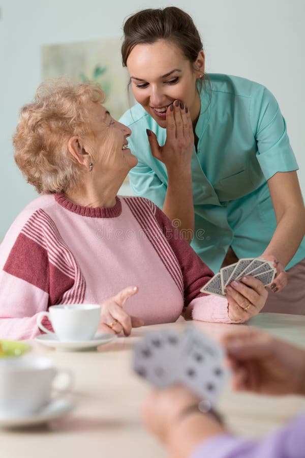Nurse helping with cards stock image. Image of helpful - 52764543