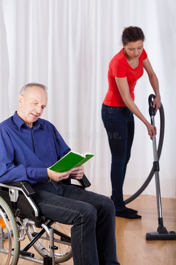 Nurse helping elderly man stock photo. Image of aged - 60119242