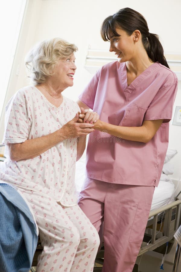 Nurse Helping Senior Woman To Walk Stock Image - Image of assisting ...