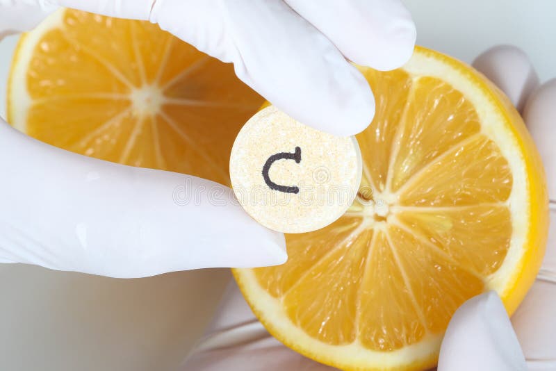 Nurse is Hold Vitamin C Tablet and Fresh Lemon Stock Image - Image of ...