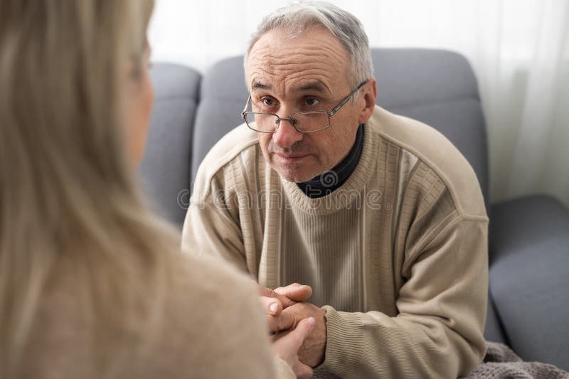 Nurse Holding Hand of Senior Man in Rest Home Stock Image - Image of ...