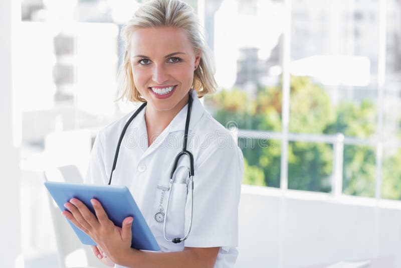 Nurse Holding a Tablet Computer Stock Photo - Image of touchscreen ...
