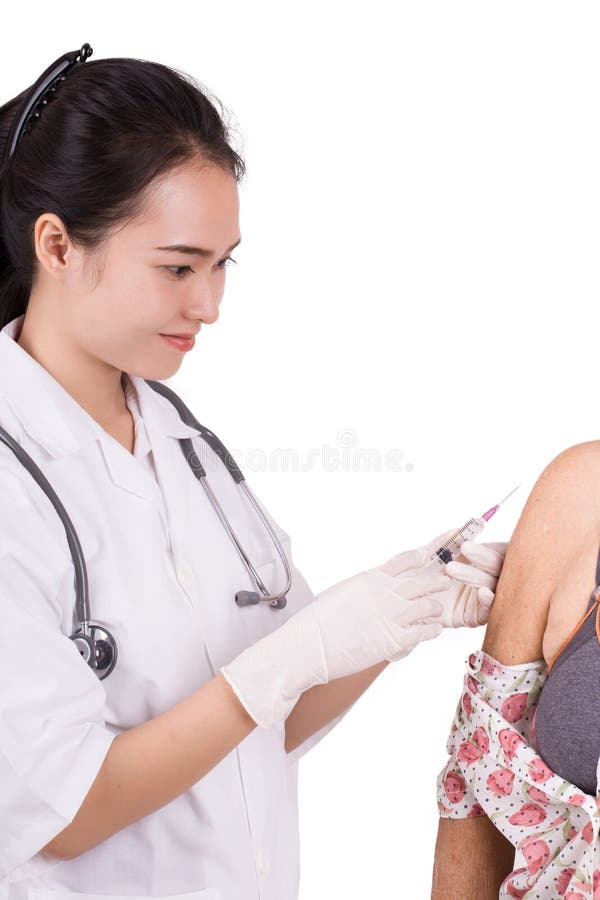 Nurse injecting a patient stock photo. Image of woman - 61896064
