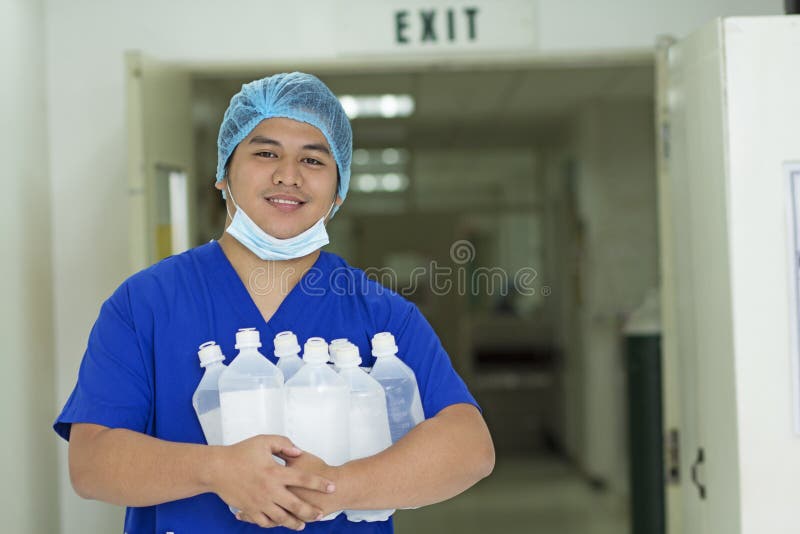 Nurse with IV fluids stock image. Image of professional - 52655263
