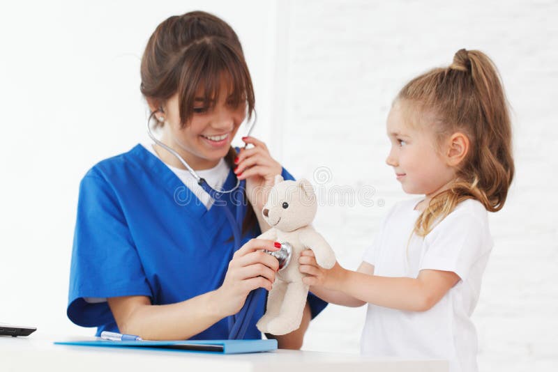 Nurse and kid stock photo. Image of assistant, pediatric - 57154470