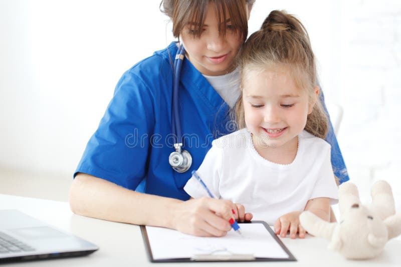Nurse and kid stock photo. Image of assistant, pediatric - 57154470
