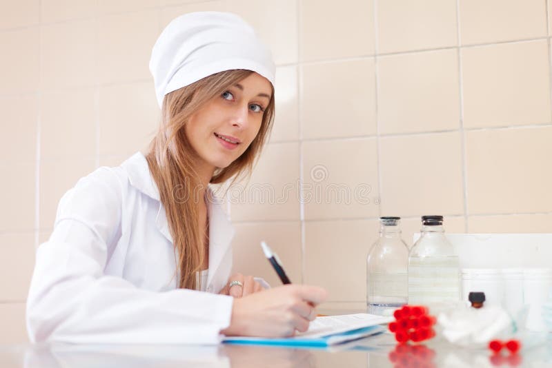 Nurse in the laboratory stock photo. Image of experiment - 43762480