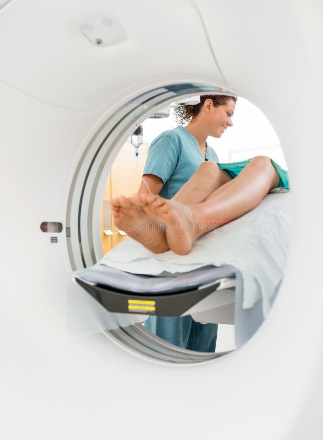 Nurse Looking at Patient Undergoing CT Scan Stock Photo - Image of ...