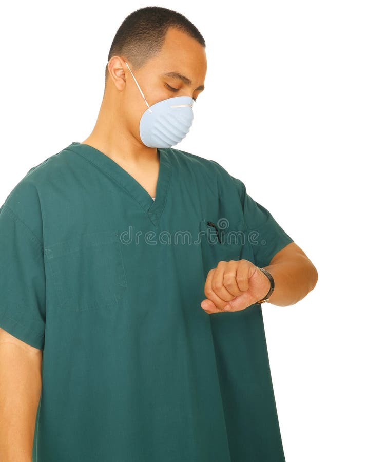 Nurse Looking at Watch stock image. Image of green, male - 5294347