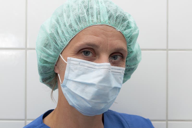 Masked Nurse with an Infusion Stock Photo - Image of examination, aged ...