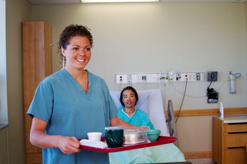 Nurse with meal tray stock photo. Image of care, ward - 36674752