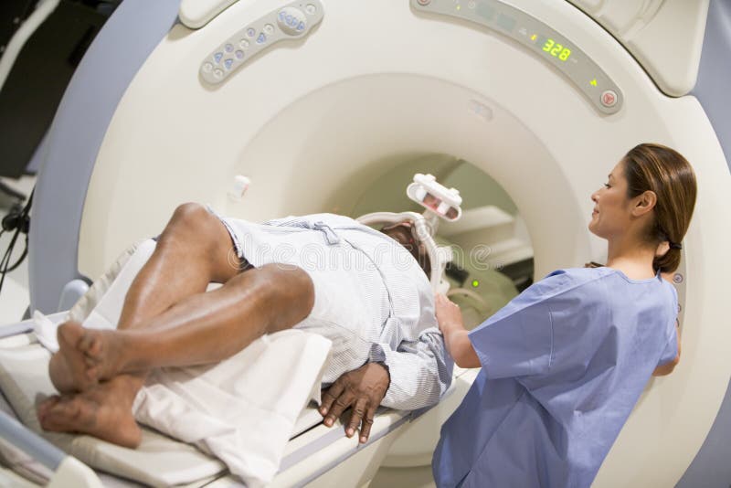 Nurse with Patient As they Have CAT Scan Stock Image - Image of people ...
