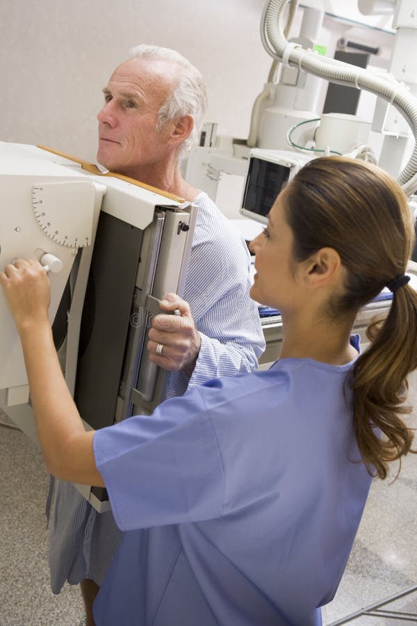 Nurse Monitoring Patient Having CAT Scan Stock Image - Image of nurse ...