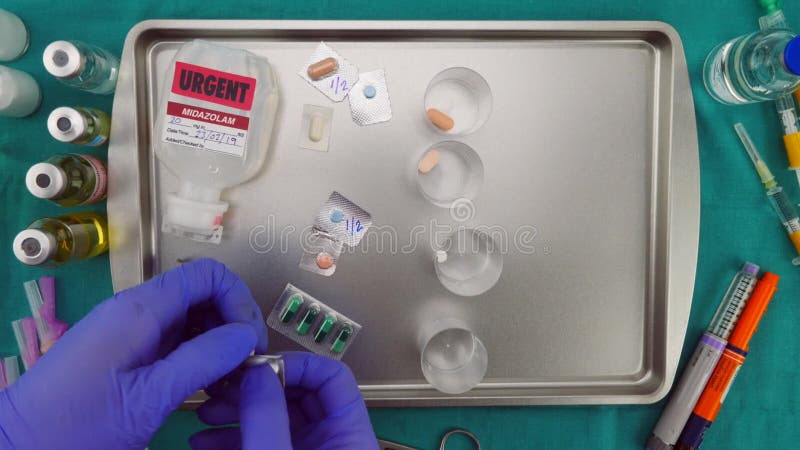 Nurse Preparing Hospital Medication, Extracting with Syringe Parenteral ...