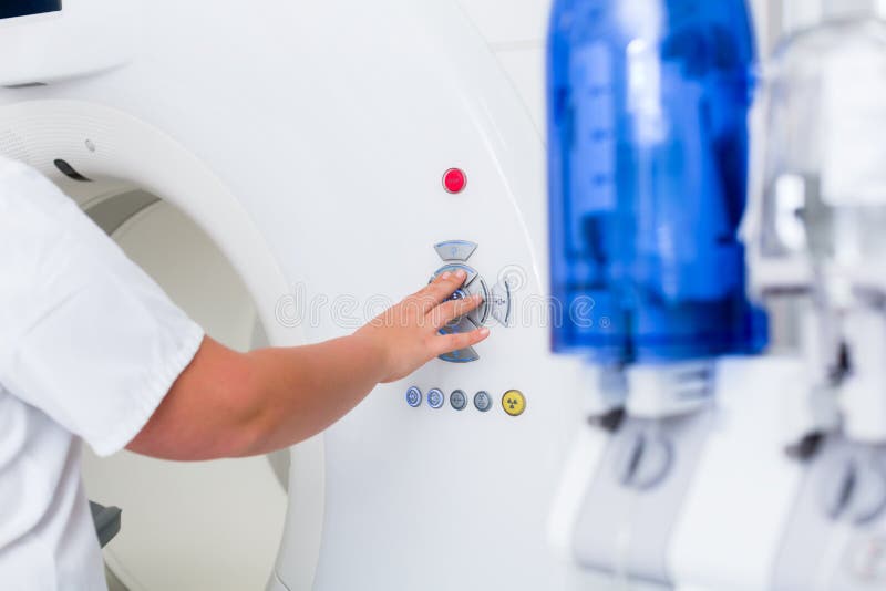 Nurse Pressing Button on CT Machine in Hospital Stock Photo - Image of ...