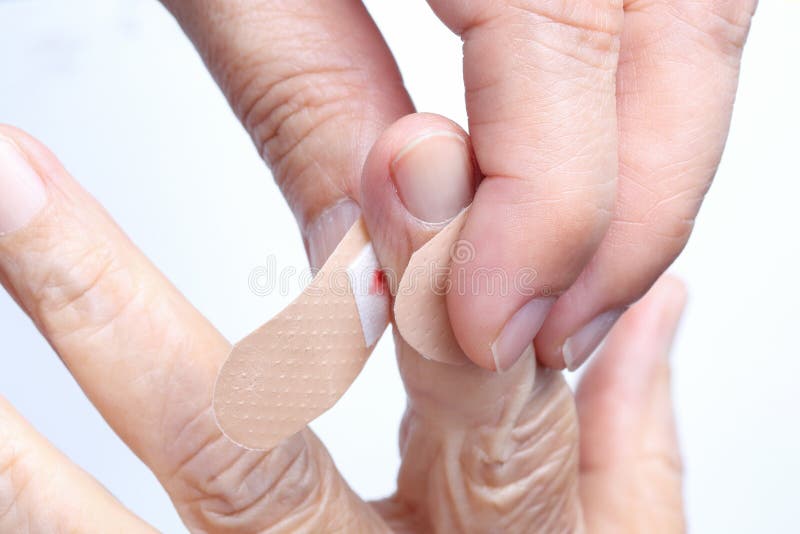 Nurse Putting Adhesive Bandage on Elderly Hand Stock Image - Image of ...