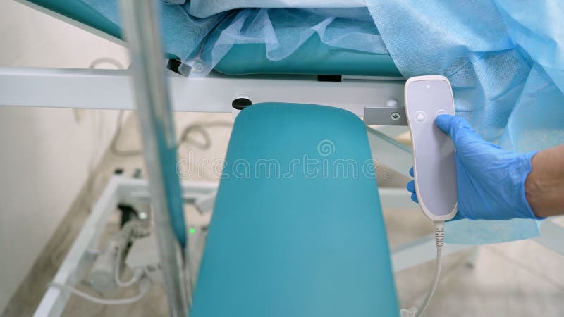 Using the Remote Control, the Nurse Raises the Couch. the Nurse Raises ...