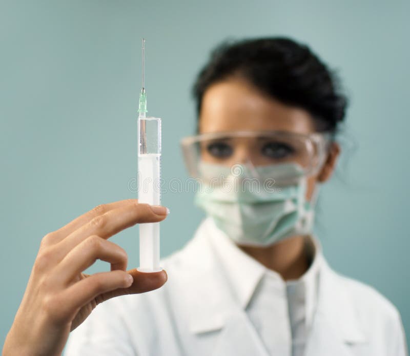 Nurse ready for injection stock image. Image of pressing - 13644497