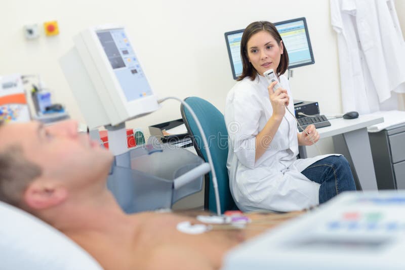 Nurse Recording Observation Stock Photo - Image of electrode, observe ...