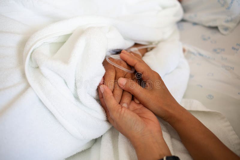 Nurse`s Hands are Encouraging the Patient To Have Life Support Stock ...