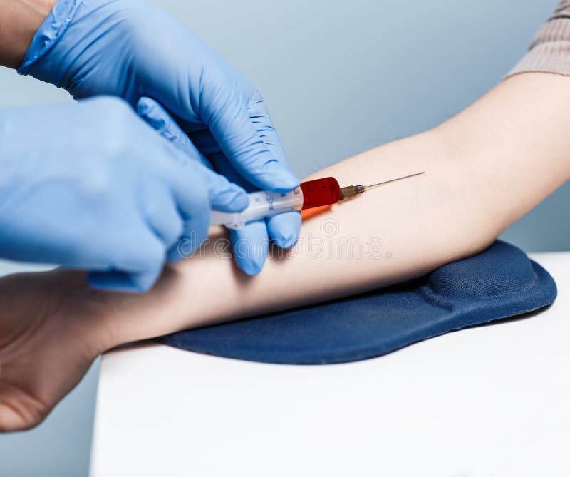 Venipuncture,Drawing Blood stock photo. Image of hands - 40067590