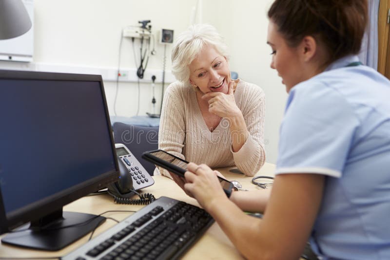 Nurse Showing Patient Test Results on Digital Tablet Stock Image ...