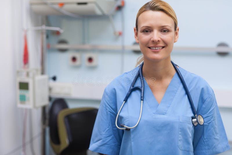 Female Nurse Wearing Stethoscope Standing in Hospital Room Smiling Next ...