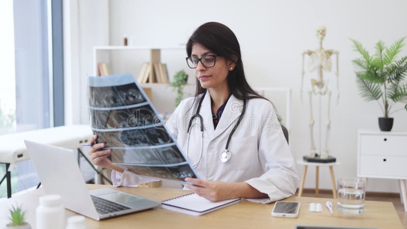 Nurse Studying CT Brain Scans in Doctor S Office Interior Stock Video ...