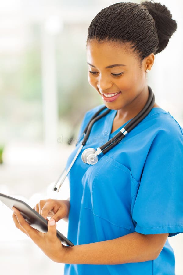 Nurse tablet pc stock photo. Image of medical, attractive - 33291744