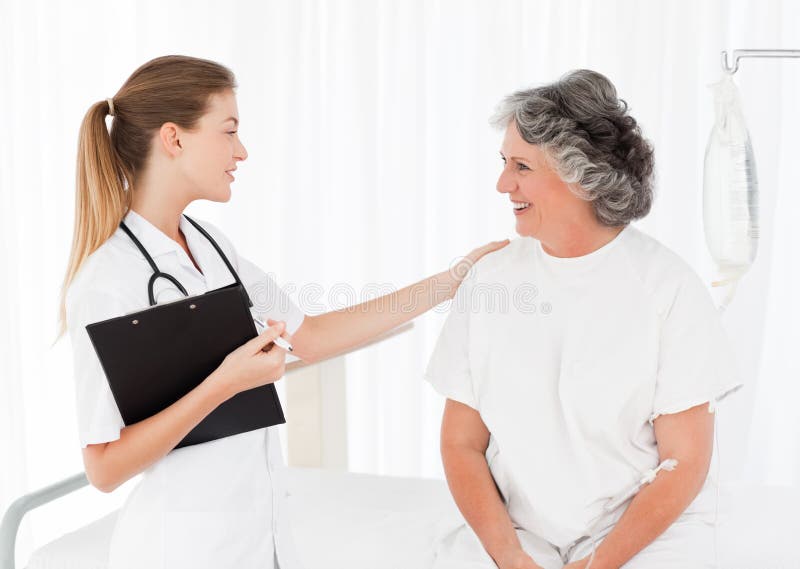 Nurse Talking with Her Patient Stock Image - Image of nursing ...