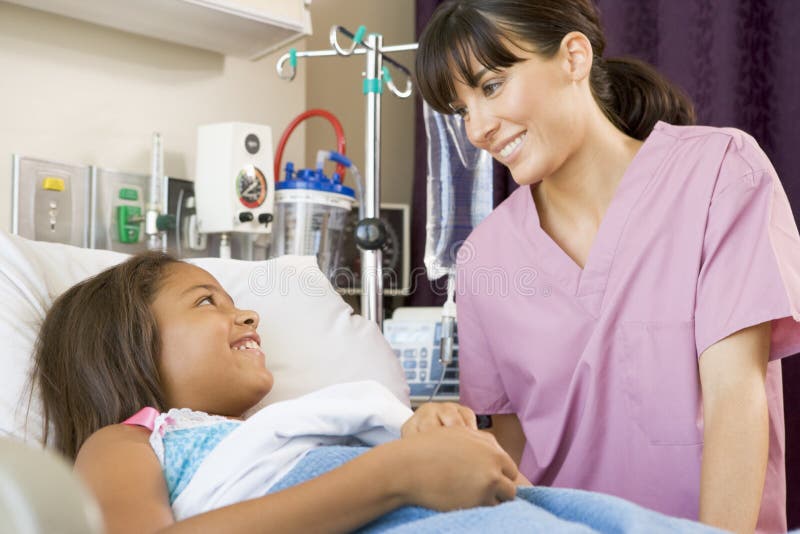 Nurse Talking To Young Patient Stock Photo - Image of color, comforting ...
