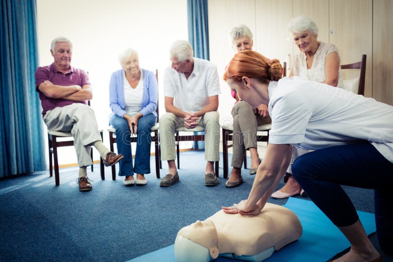 Nurse Teaching First Aid To a Group of Seniors Stock Image - Image of ...