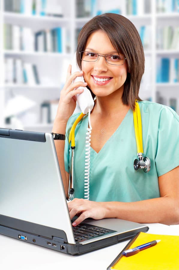 Nurse with Telephone and Laptop Stock Image - Image of clinical ...