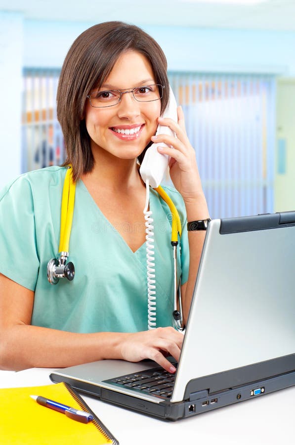 Nurse with Telephone and Laptop Stock Image - Image of clinical ...