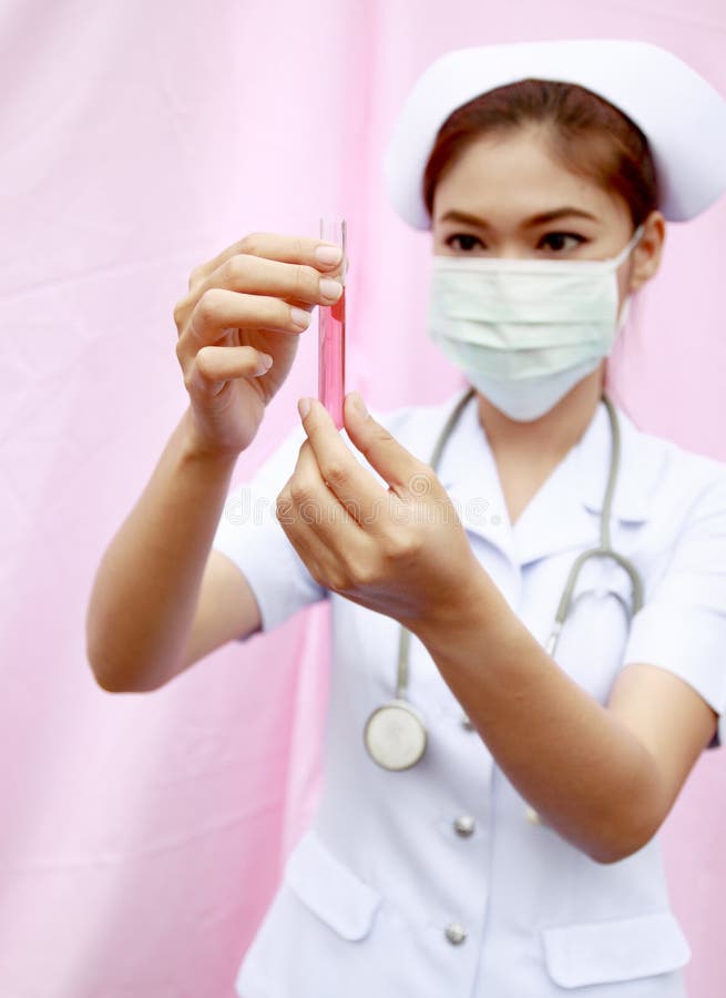 Nurse with test tube stock image. Image of analysis, laboratory - 26459359