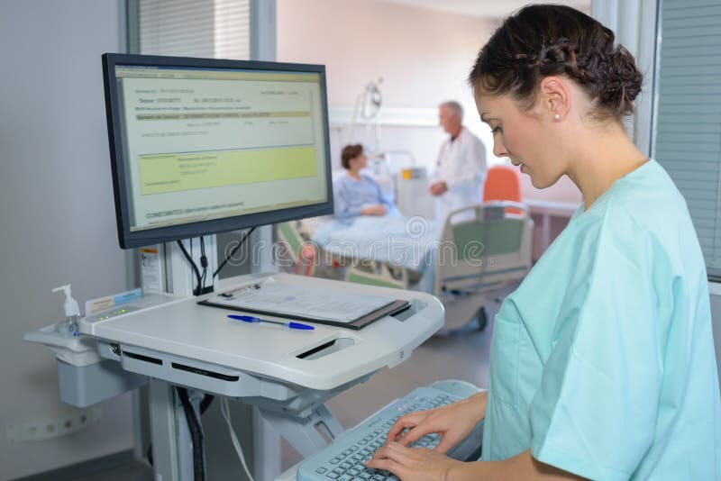 Nurse Typing on Computer Keyboard Stock Image - Image of profession ...
