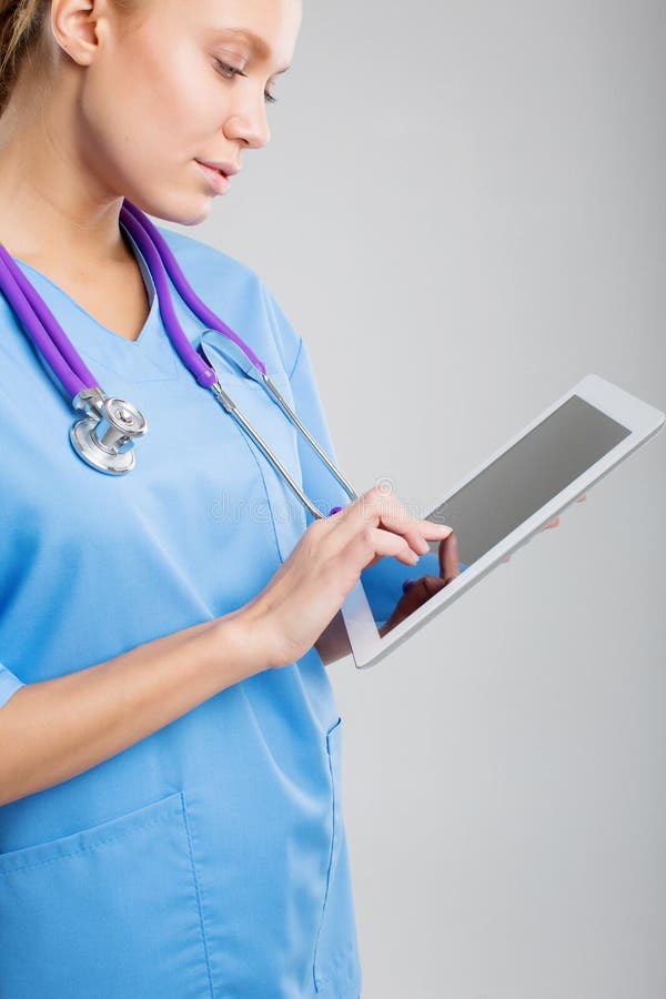 Nurse Using Digital Tablet stock image. Image of medicine - 40092197