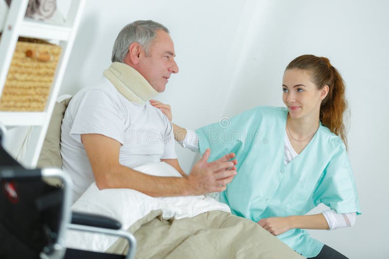Nurse visiting sick man stock photo. Image of treatment - 102665736