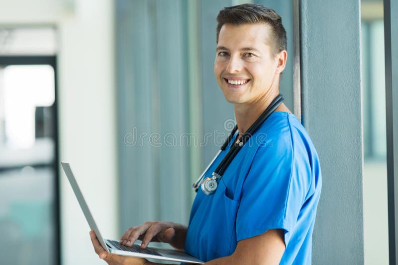 Nurse working laptop stock image. Image of attractive - 56751123
