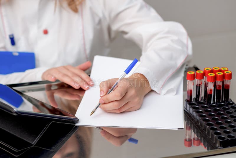 Nurse Writes Blood Diagnosis on Paper Stock Image - Image of paper ...