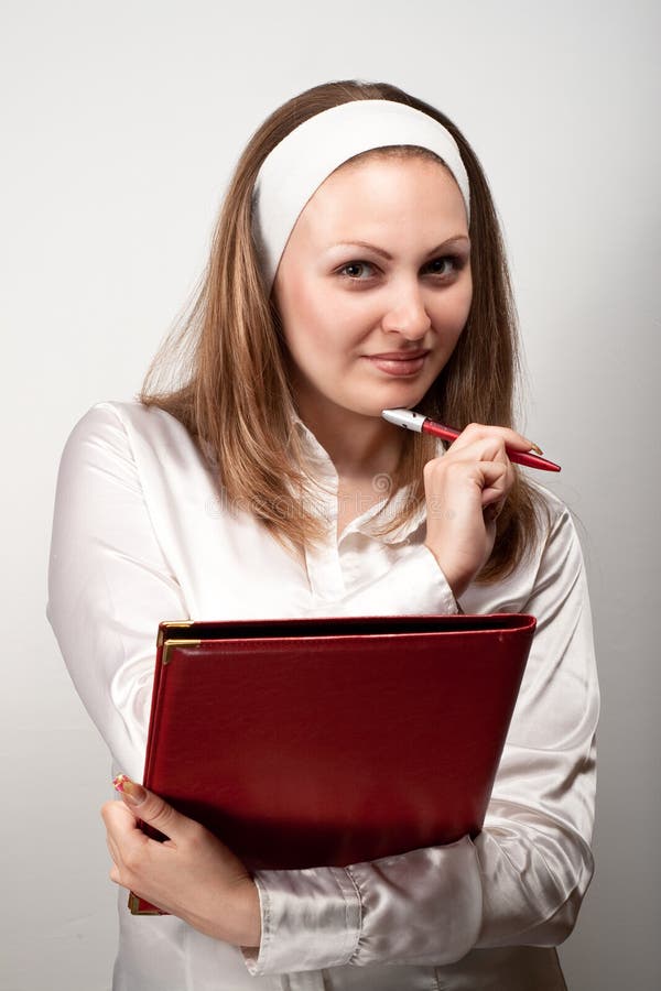 Nurse Writing In Red Book Picture. Image: 14358585