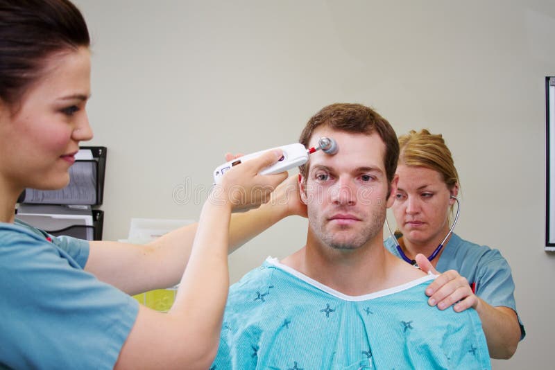 Nurses Assessing Patient Stock Photos - Free & Royalty-Free Stock ...