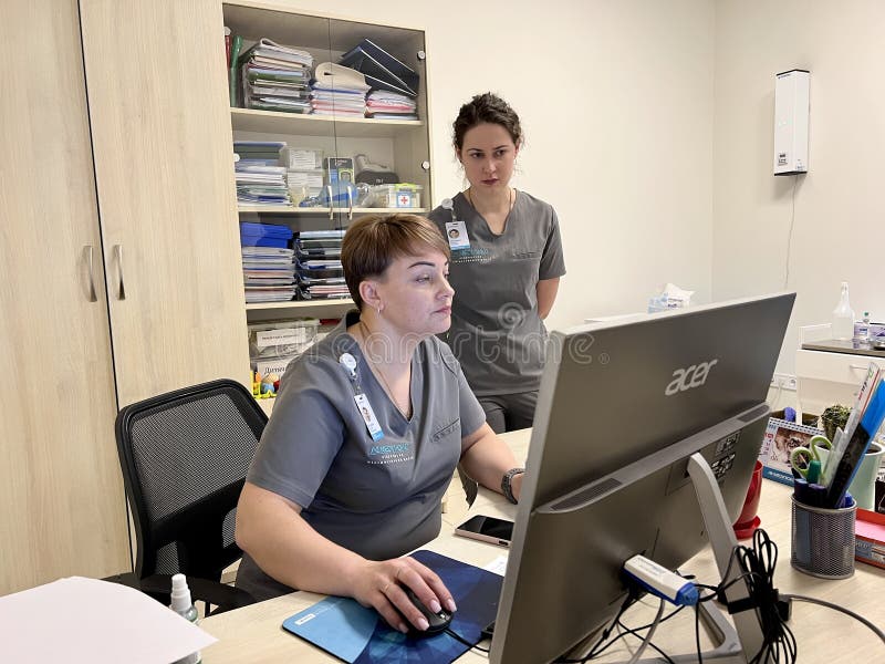 Nurses Working at the Computer in the Hospital Room Latest Wireless ...