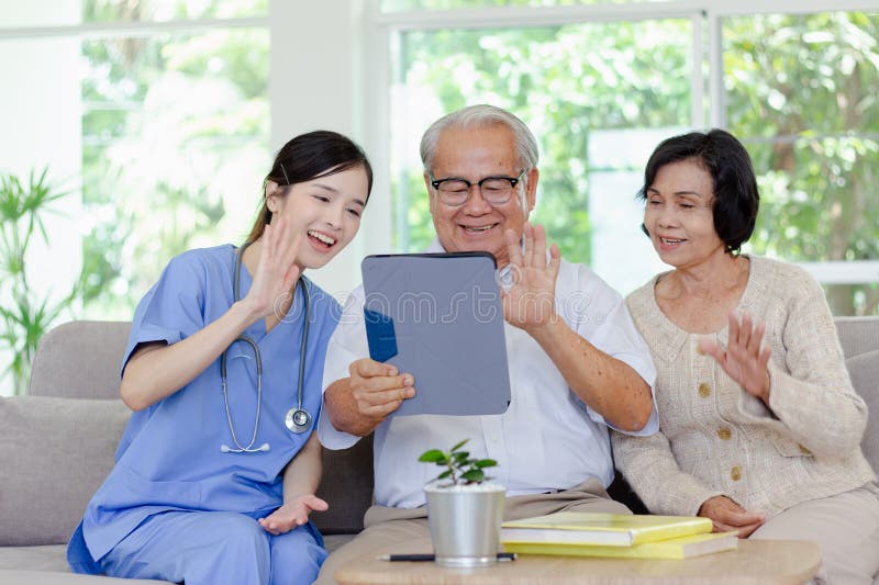 Nursing Home Care Concept. Elderly Use Tablet To Video Call To Family ...