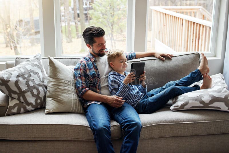 Nurture Their Curious Young Minds. a Little Boy Using a Digital Tablet ...