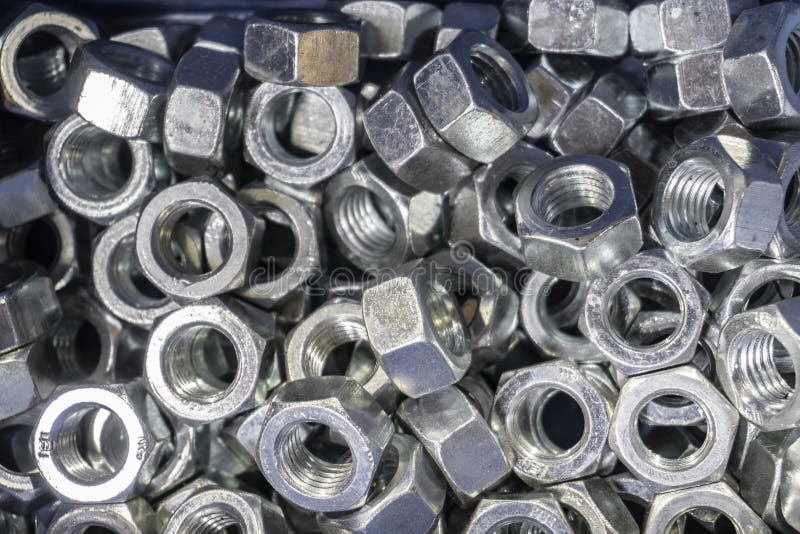 Nut Fixing Connection, Set of New Nuts in a Blue Box Stock Photo ...