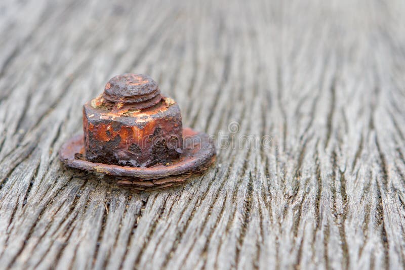 The Nut is Rust on Old Wood Floor. Stock Image - Image of machine ...