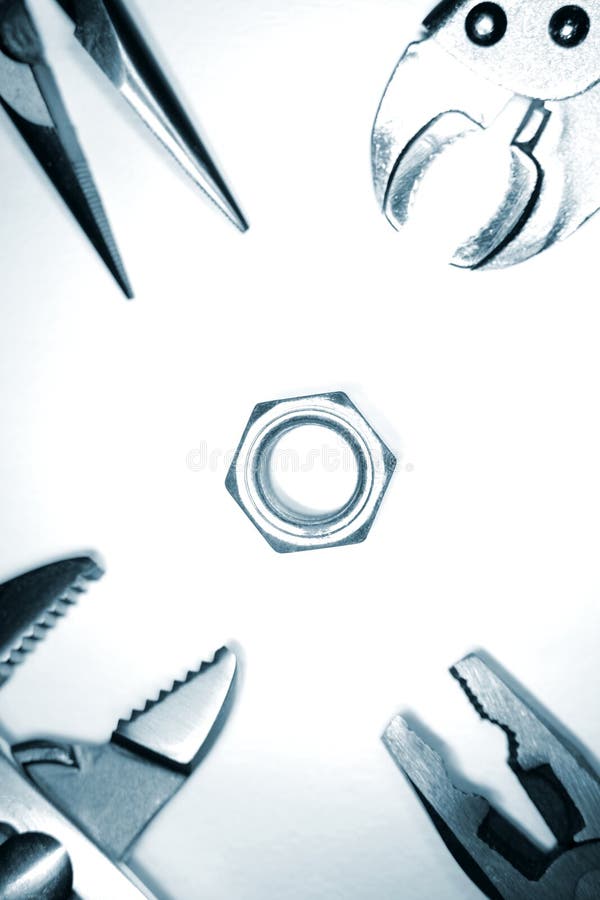 Nut and tools stock image. Image of workshop, pliers, build - 2559323